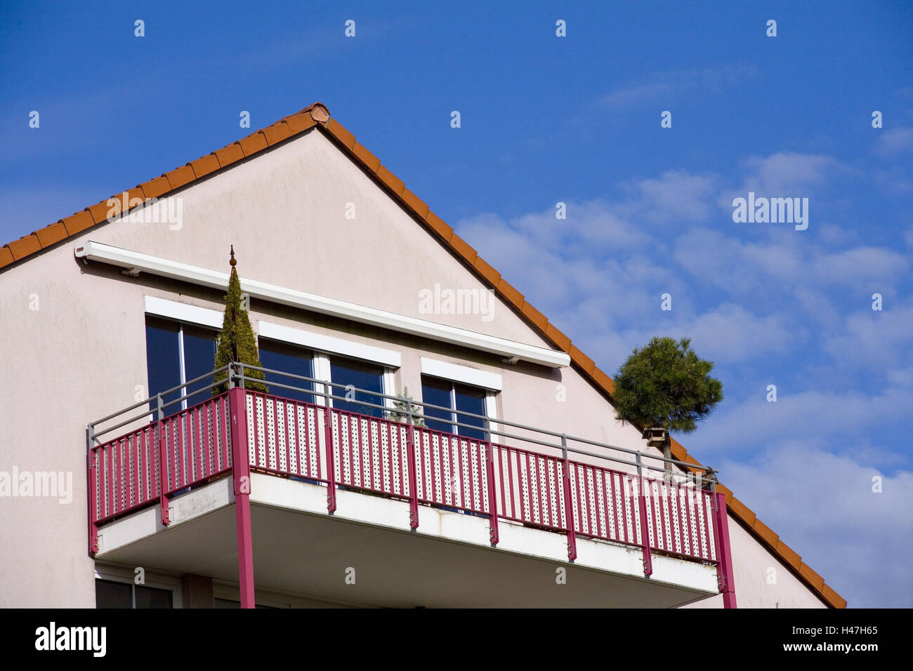 Facade with balcony Stock Photo - Alamy