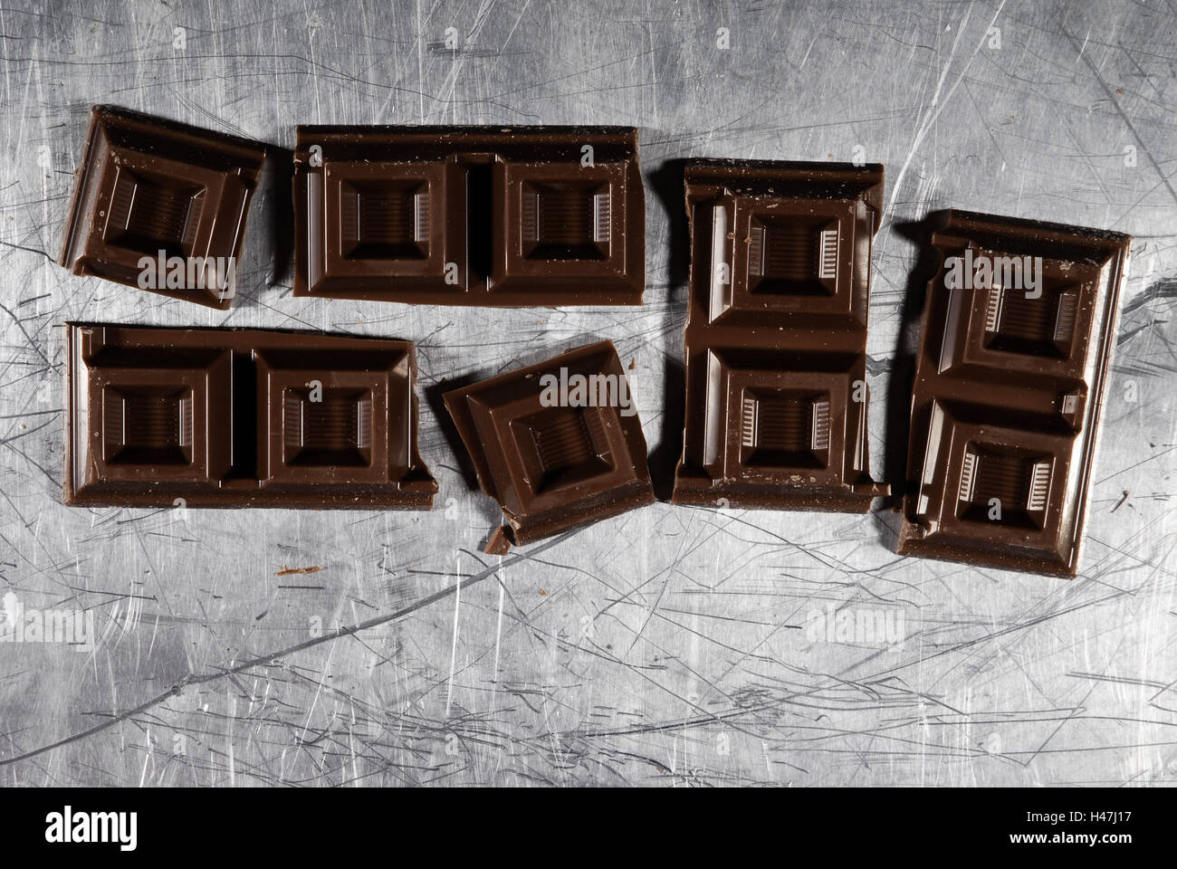 Chocolate on metal plate Stock Photo - Alamy