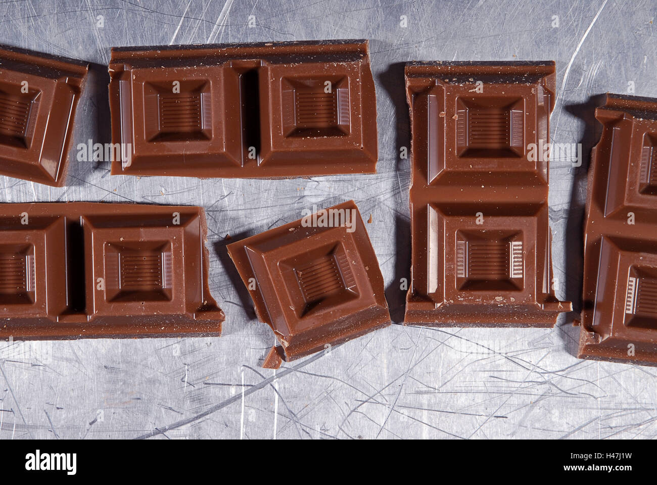 Chocolate on metal plate Stock Photo - Alamy