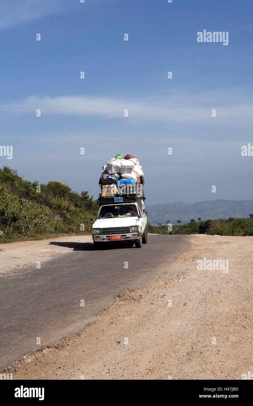 Myanmar, street, fully charged passenger car Stock Photo - Alamy