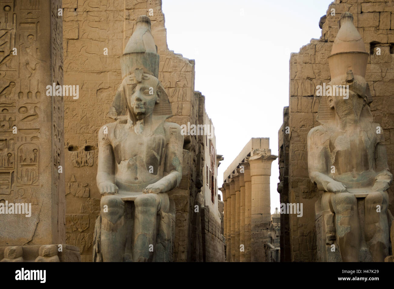 Egypt, Luxor, Luxor temple, pylon with both seat statues Ramses II and ...