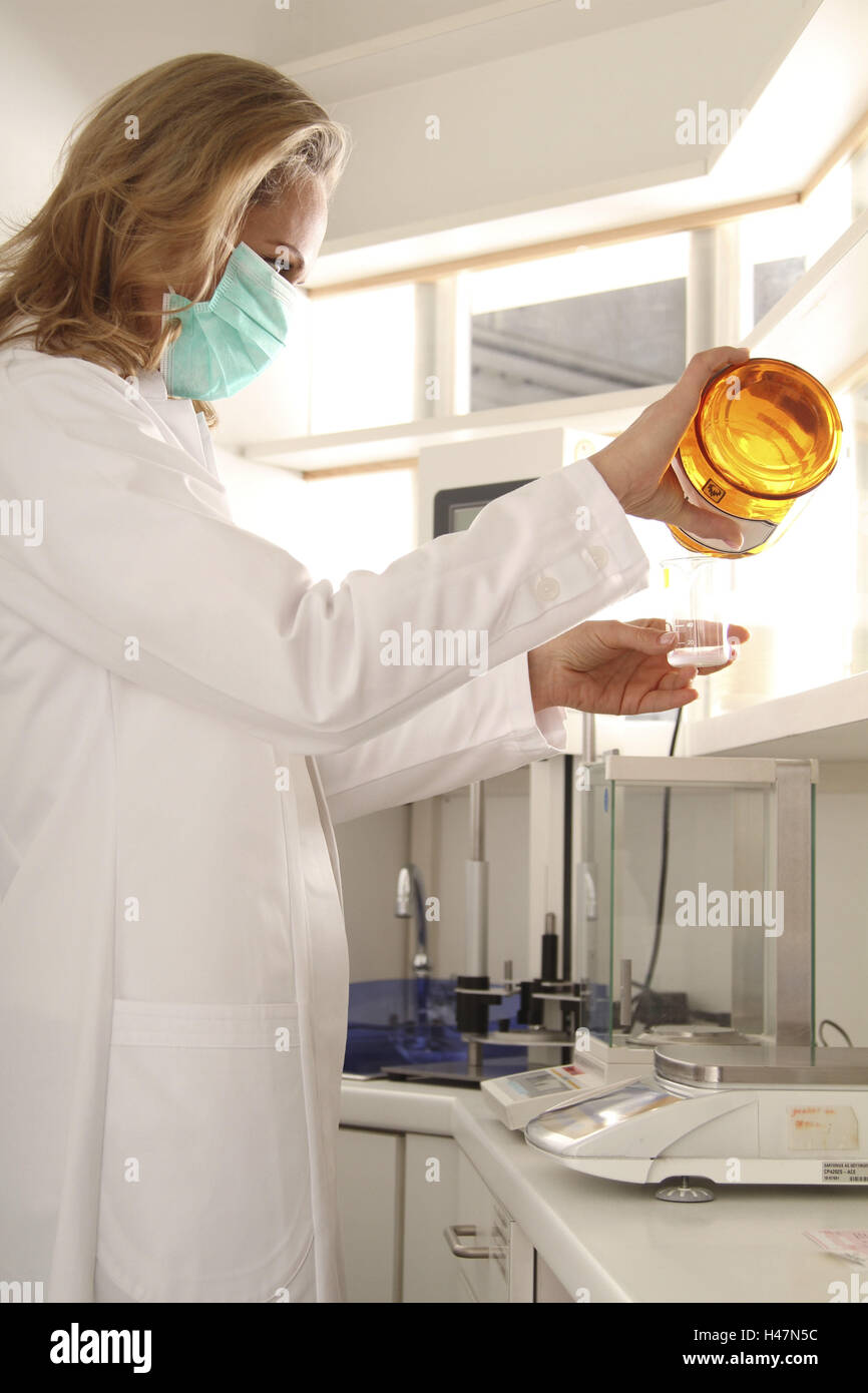 Pharmacist in the laboratory, pharmaceutical, mixing, producing Stock ...