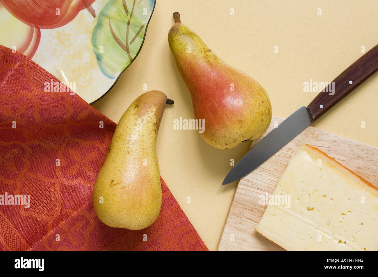two pears, sort 'Abate Fetel' with cheese Stock Photo - Alamy