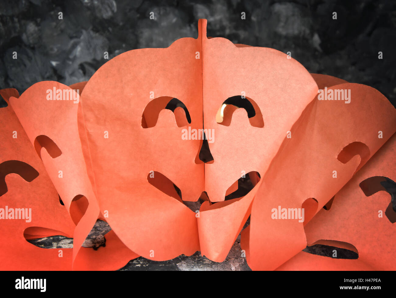 Halloween masks on dark background Stock Photo - Alamy