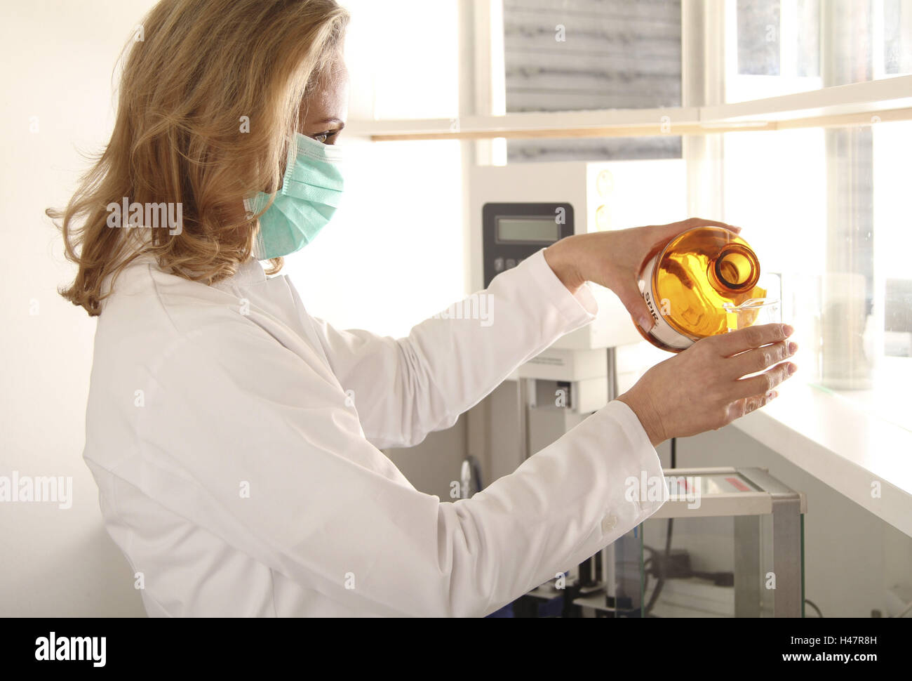 Pharmacist in the laboratory, pharmaceutical, mixing, producing Stock ...