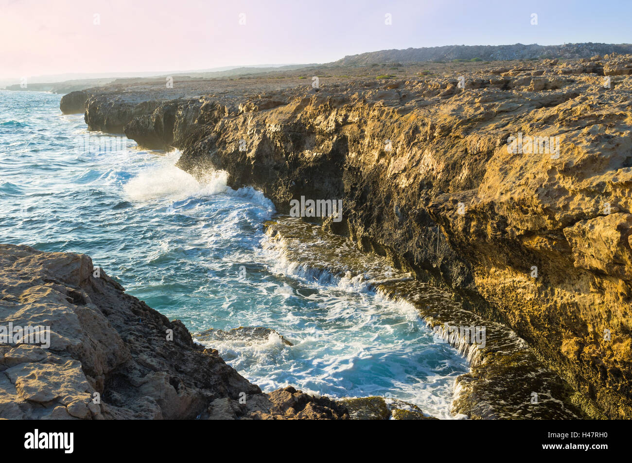 The waves breake on the rocky shore of the Cape Greco, Cyprus Stock ...