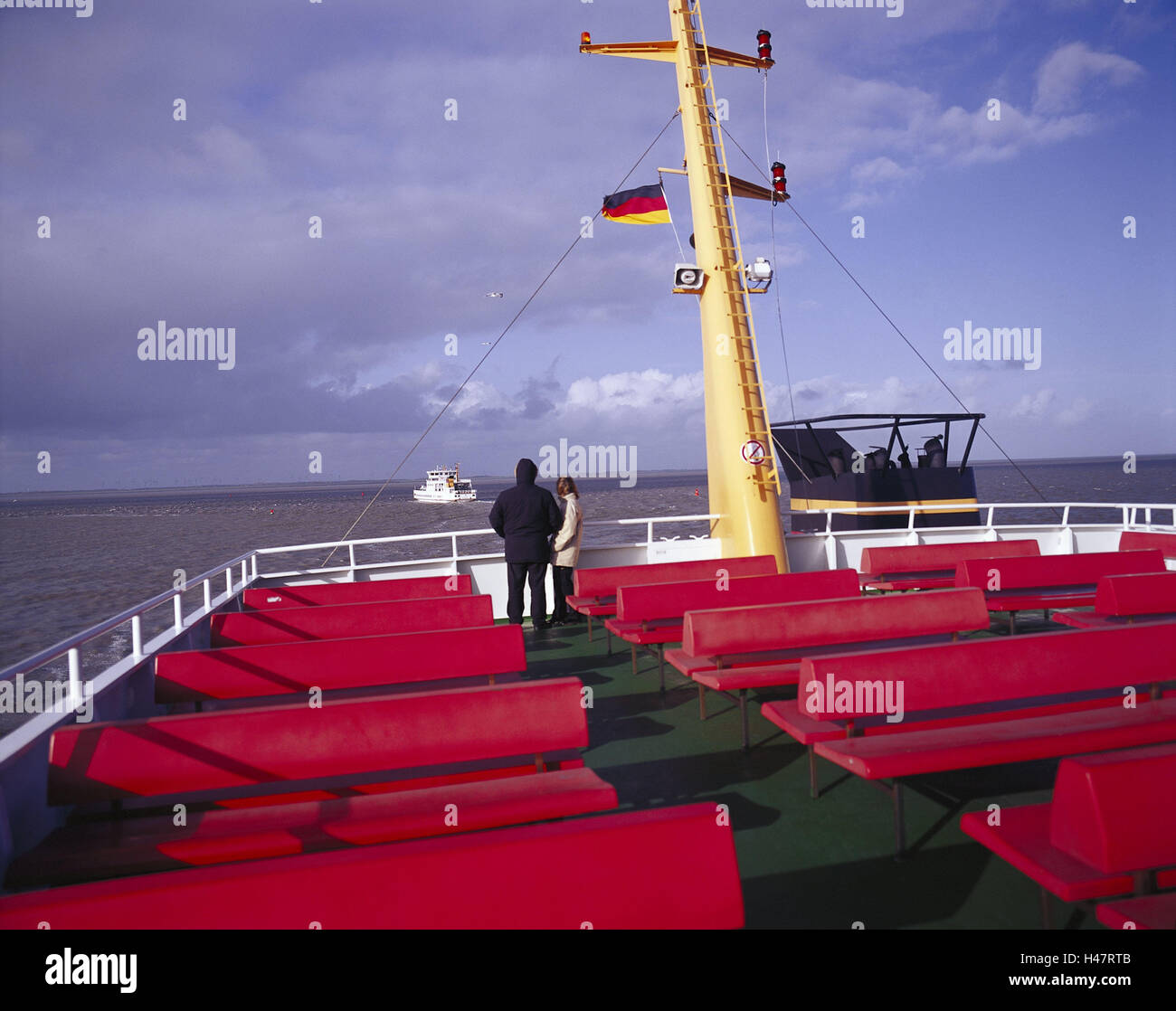 Germany, Lower Saxony, island, Norderney, ferry, passengers, back view ...