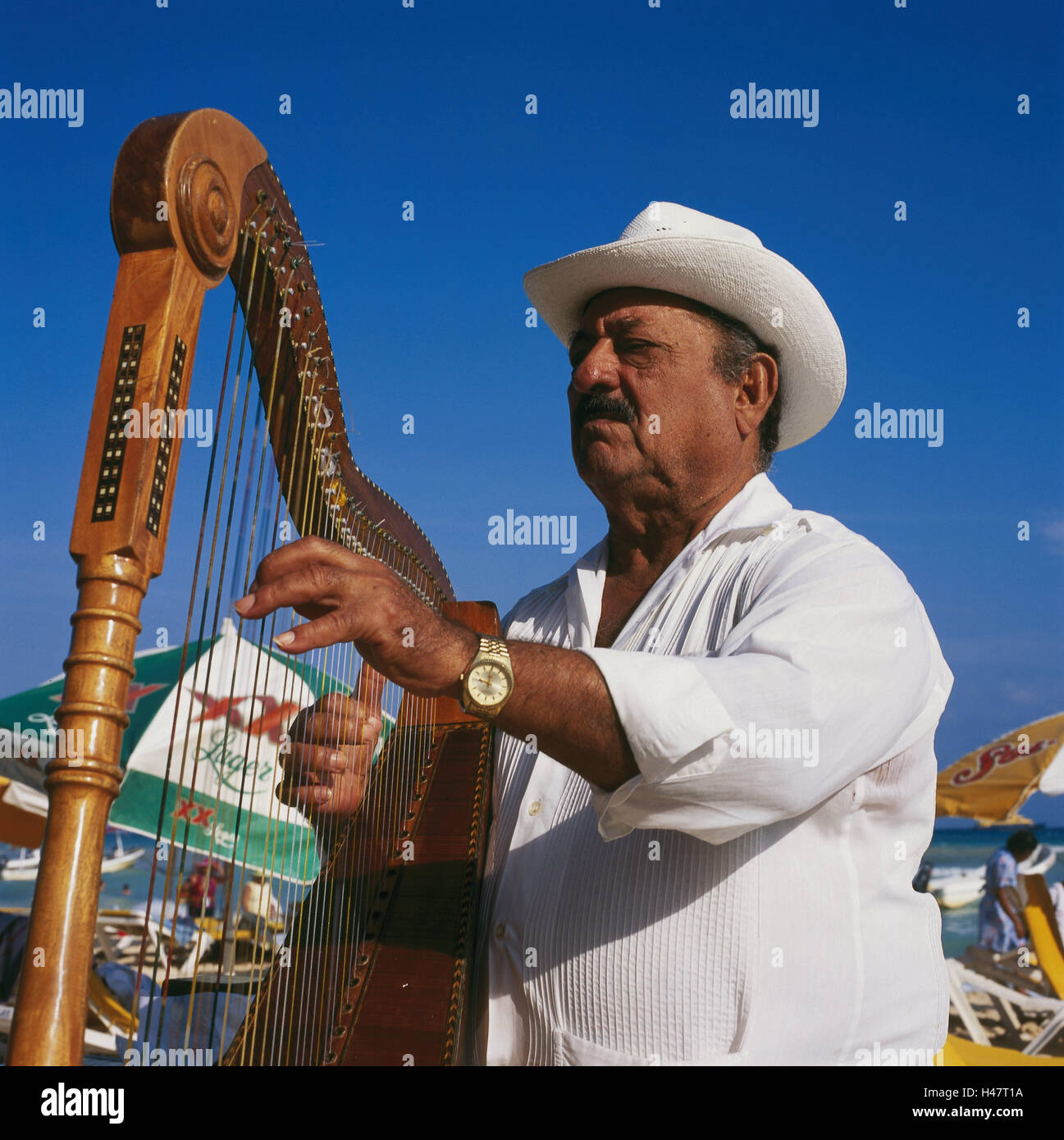 Play the harp hi-res stock photography and images - Alamy
