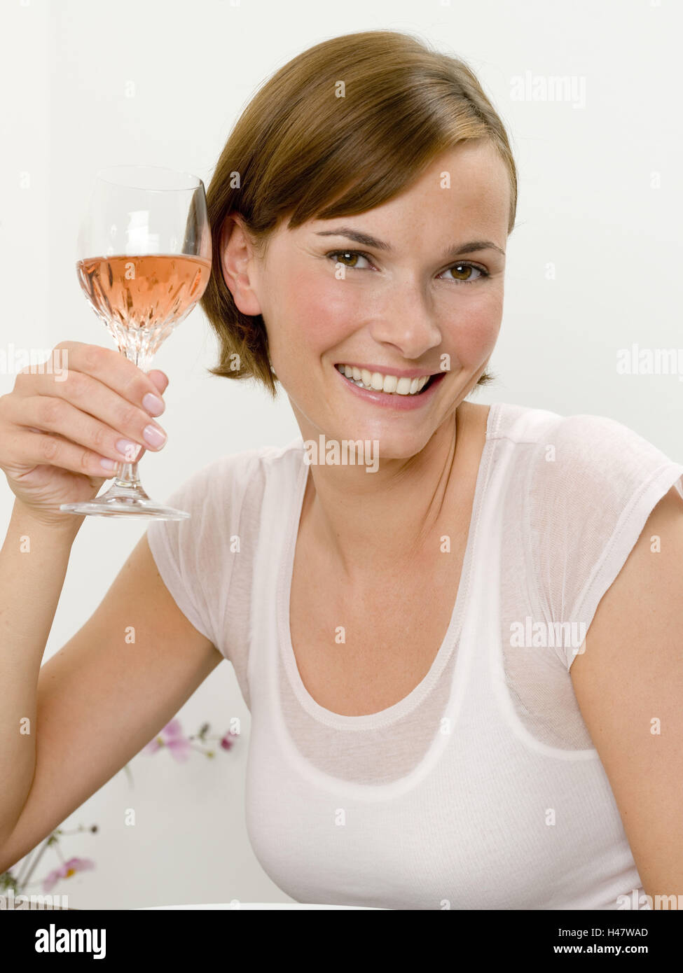 Woman, raise the glass young, wine, glass, smile Stock Photo - Alamy