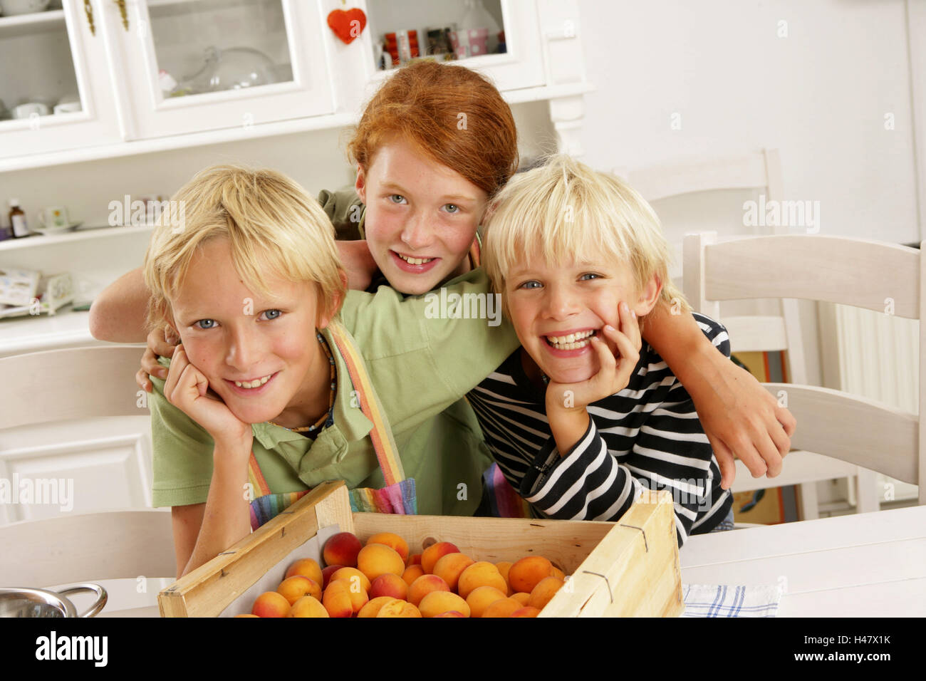 Children, cuisine, happy, smile, apricots Stock Photo - Alamy