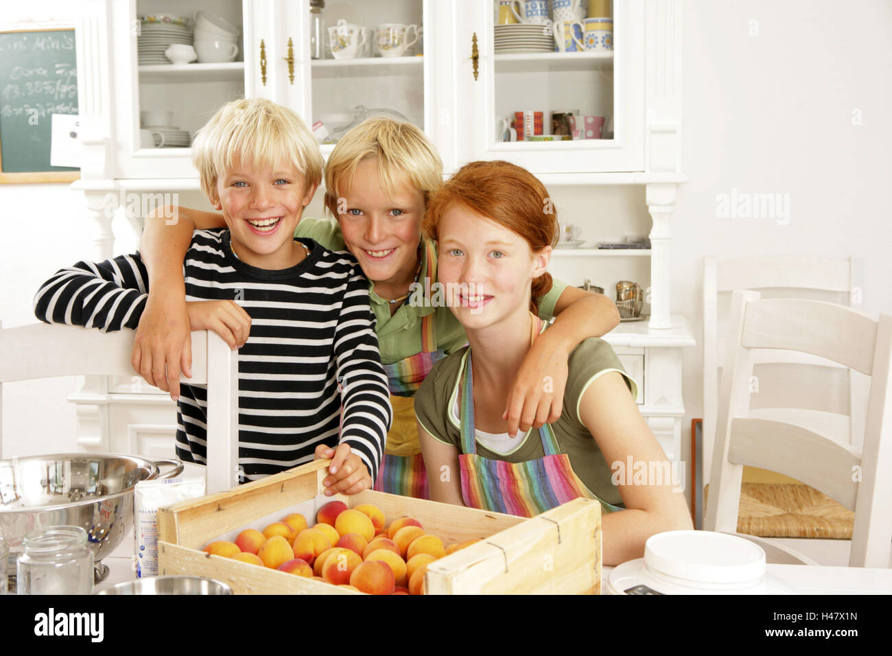 Children, cuisine, happily, smile, apricots Stock Photo - Alamy