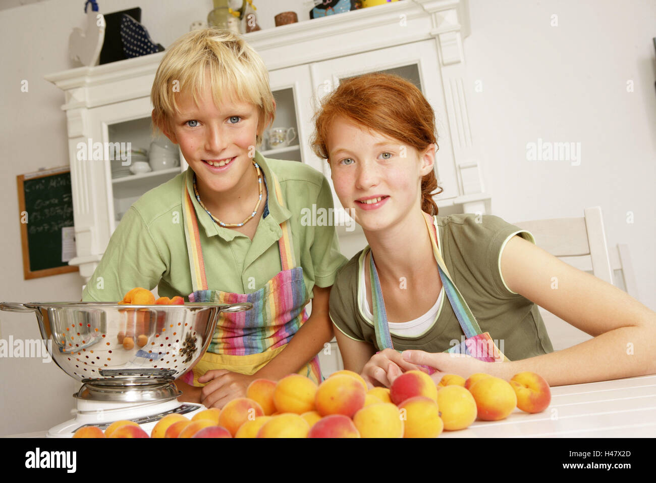 Children, cuisine, apricots, weigh Stock Photo - Alamy