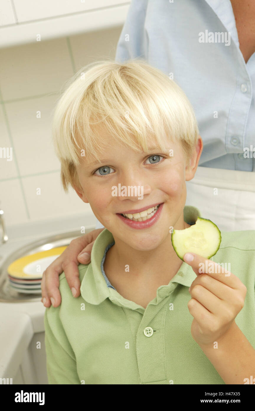 Boy, cucumber eat, portrait Stock Photo - Alamy