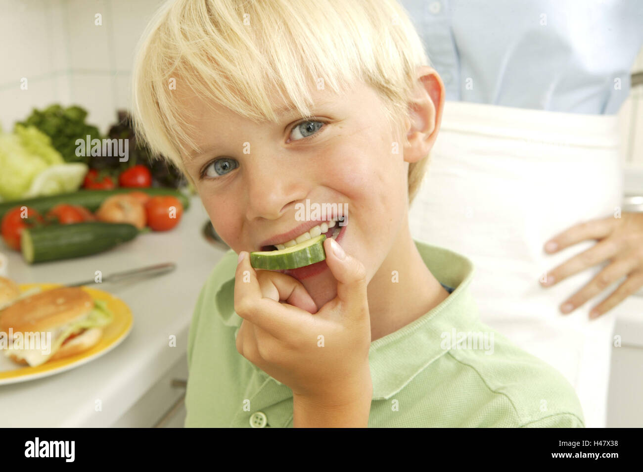 Boy, cucumber eat, portrait Stock Photo - Alamy