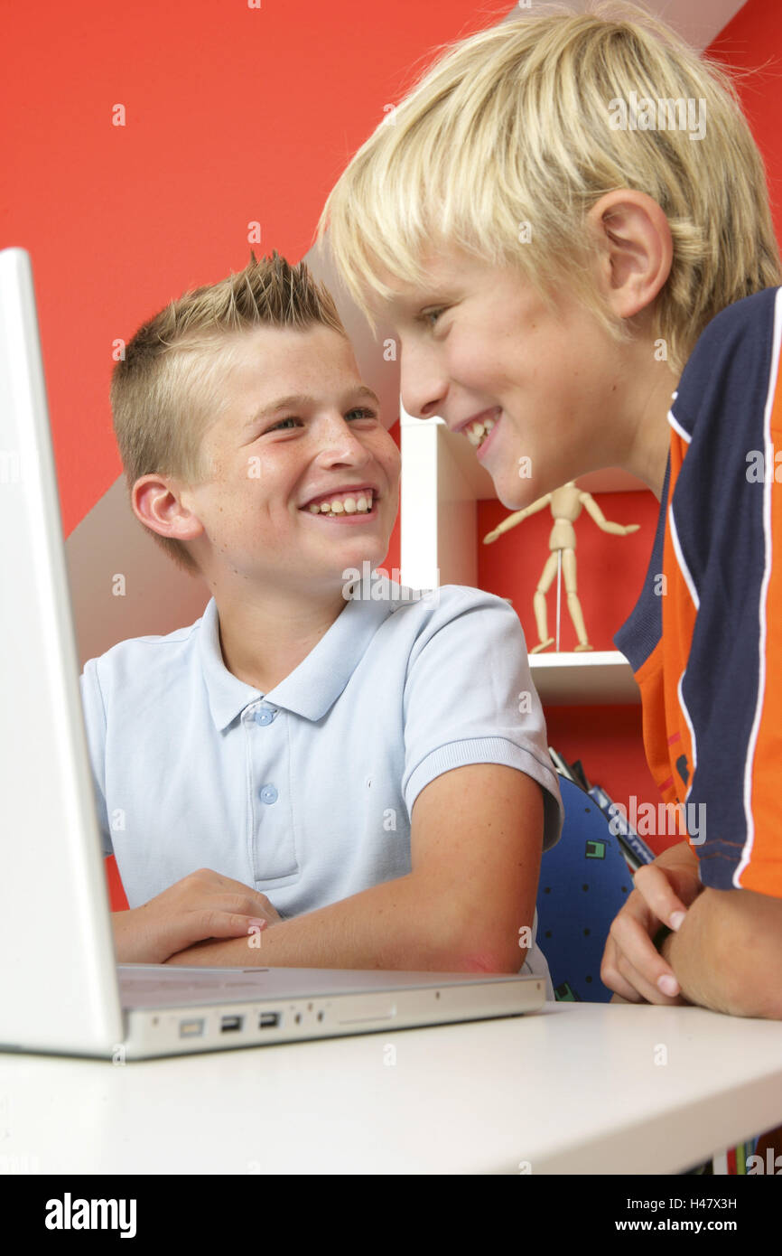 Boys, laptop, happy, laughing Stock Photo - Alamy