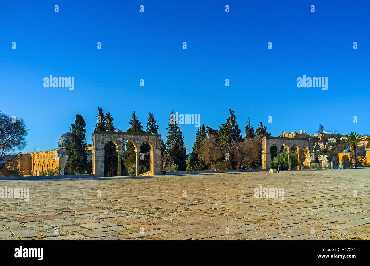 The old stone square with the arched colonnades in front of the Dome of ...