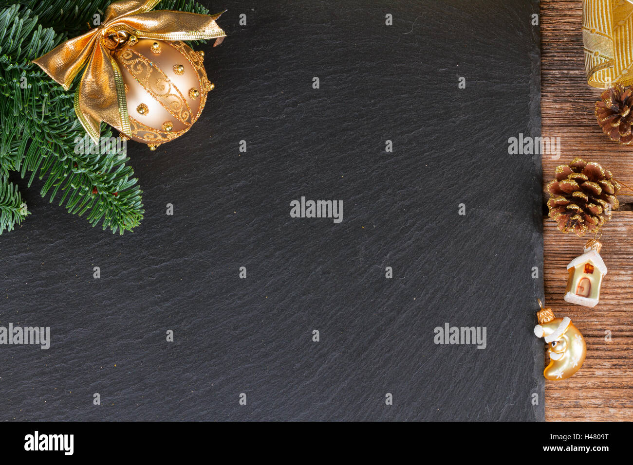 evergreen tree with golden ball Stock Photo - Alamy