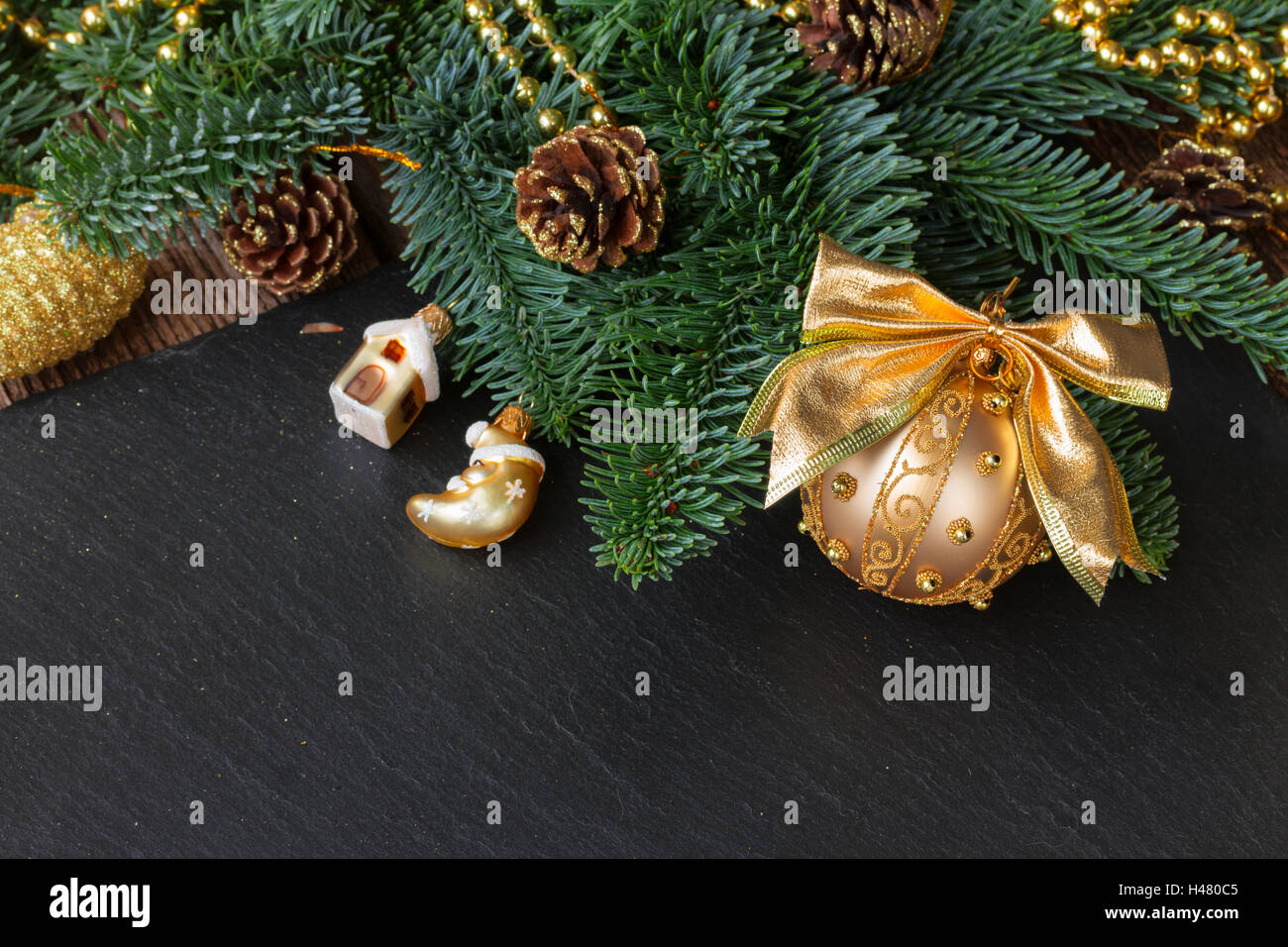 evergreen tree with golden ball Stock Photo - Alamy