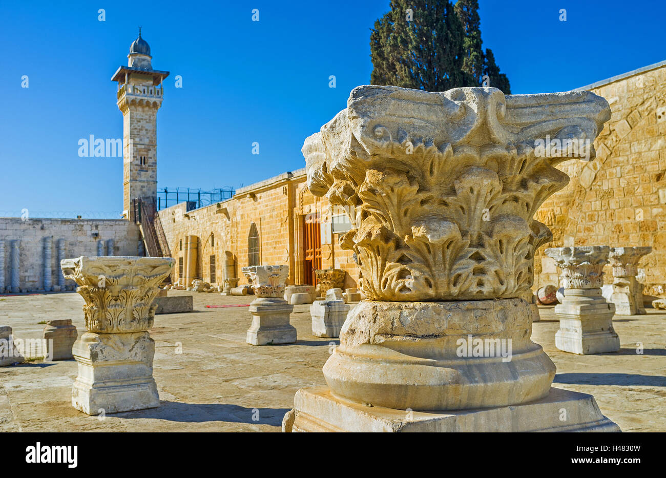 The carved stone column capital with the Al-Fakhariyya Minaret of Al ...