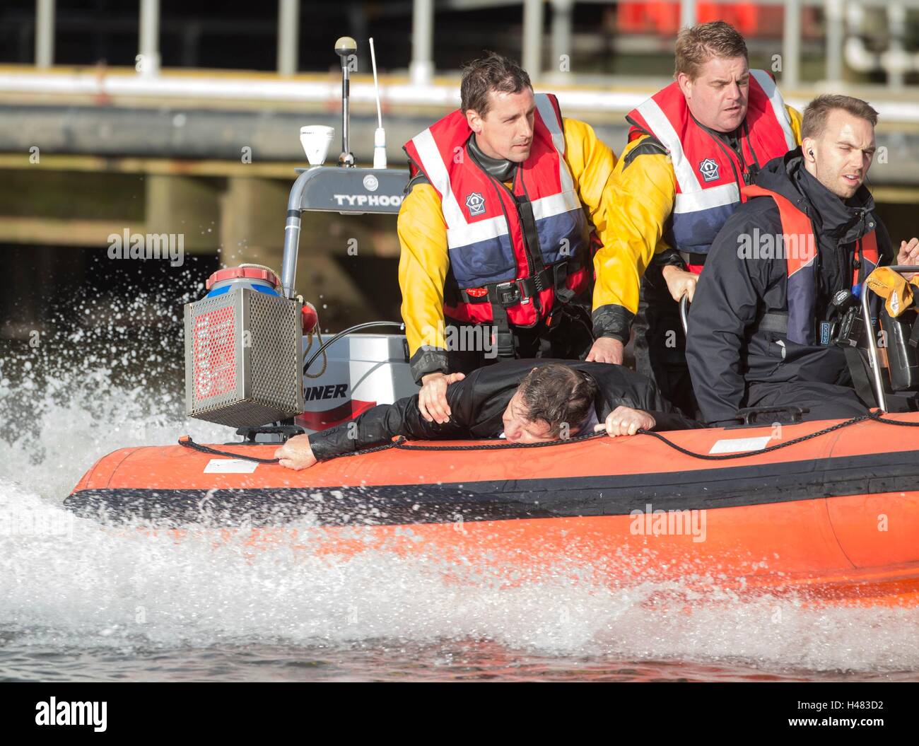 A stunt man is collected by a boat after falling from a bridge in ...