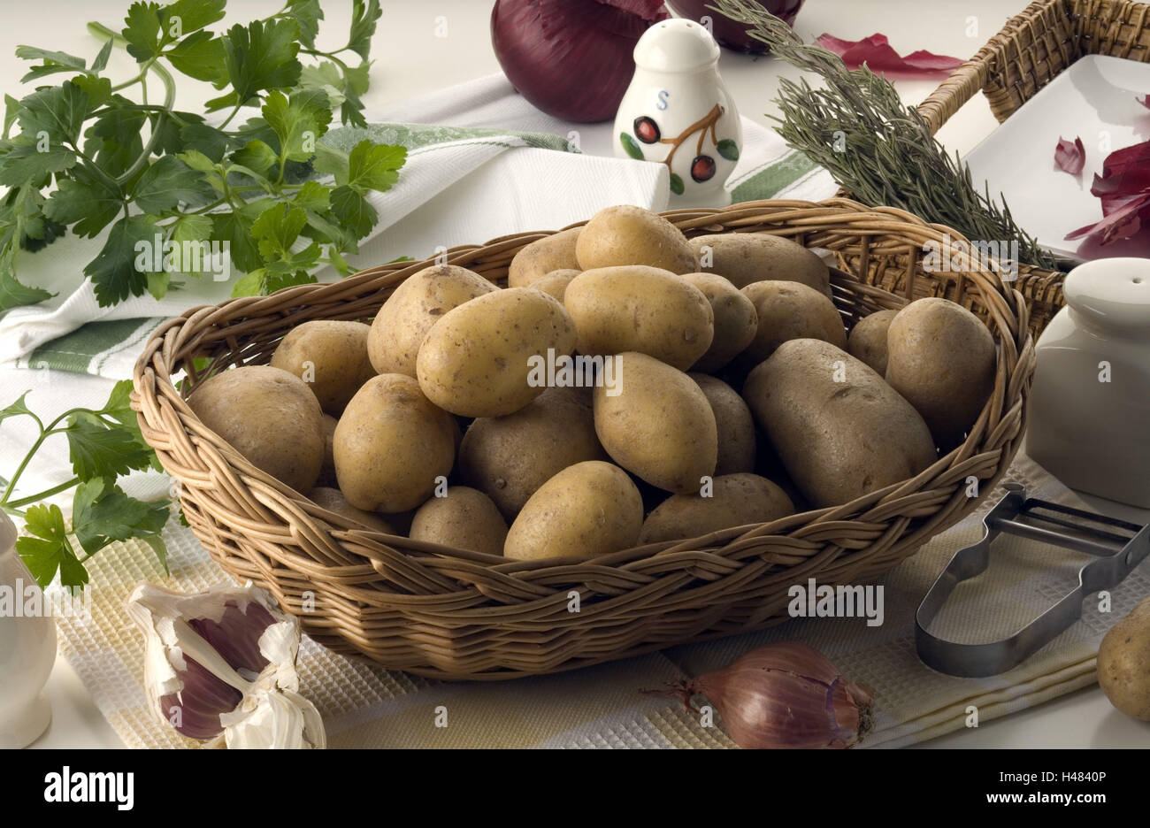 Potatoes in basket Stock Photo - Alamy