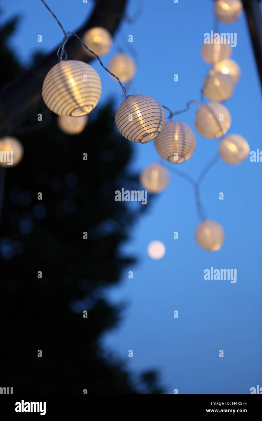 Garden party, chain of lights Stock Photo - Alamy