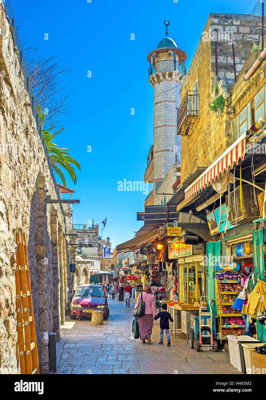 White minaret rises over hi-res stock photography and images - Alamy