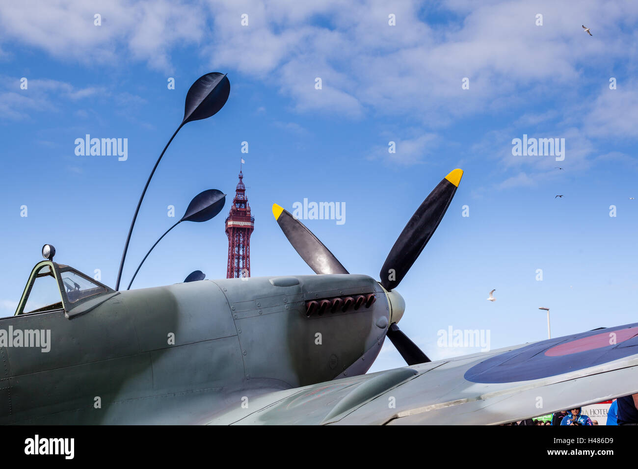 World war two spitfire on the sea front at Blackpool with the tower and ...