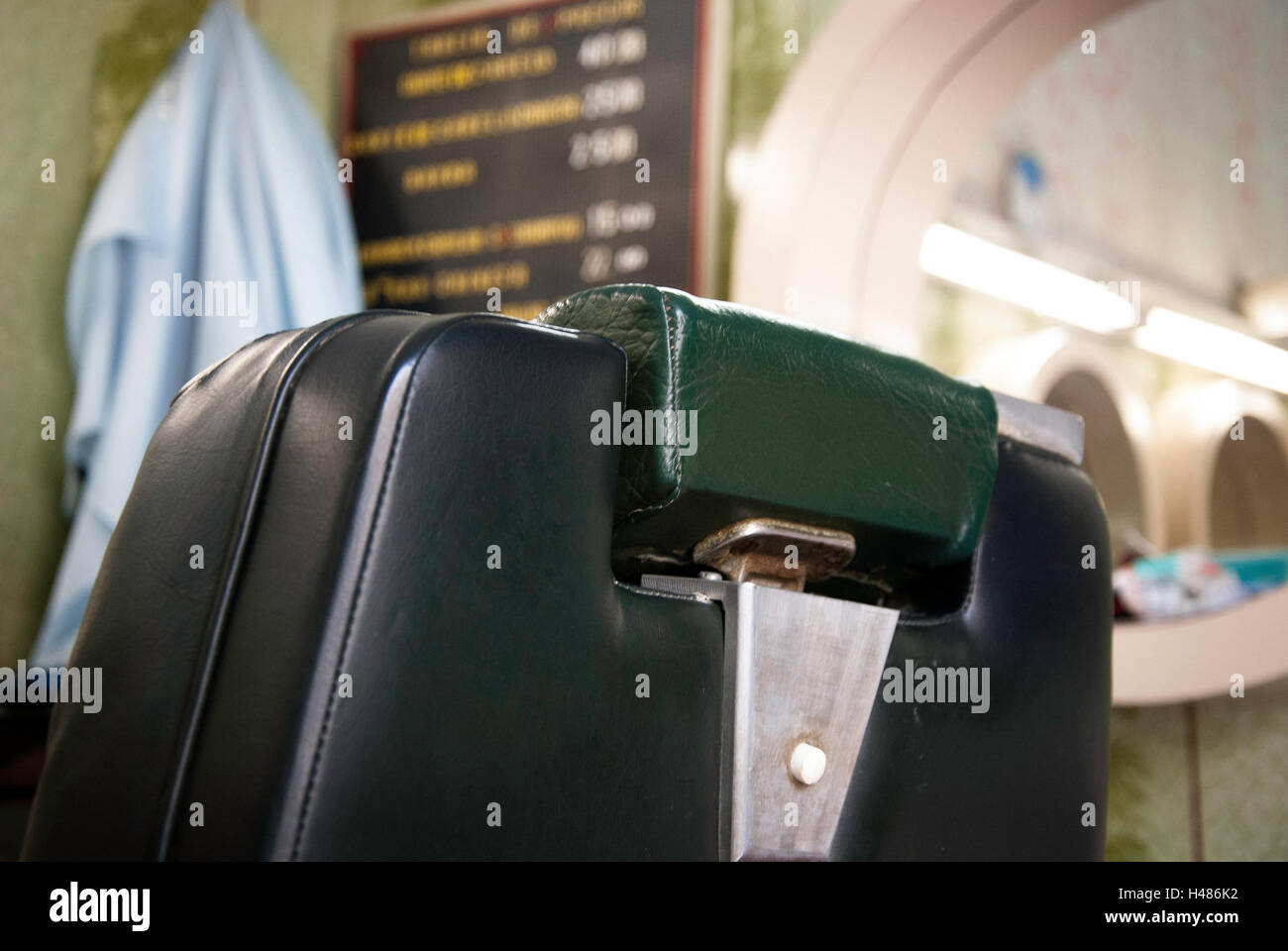 Old barber shop with a vintage design and green colors Stock Photo - Alamy