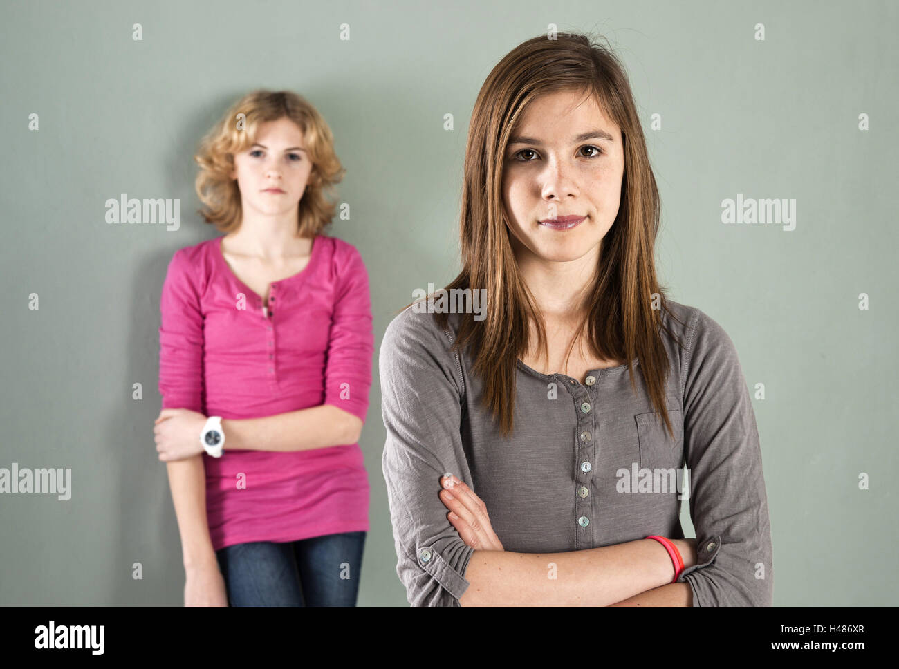 Two girls are in dispute Stock Photo - Alamy