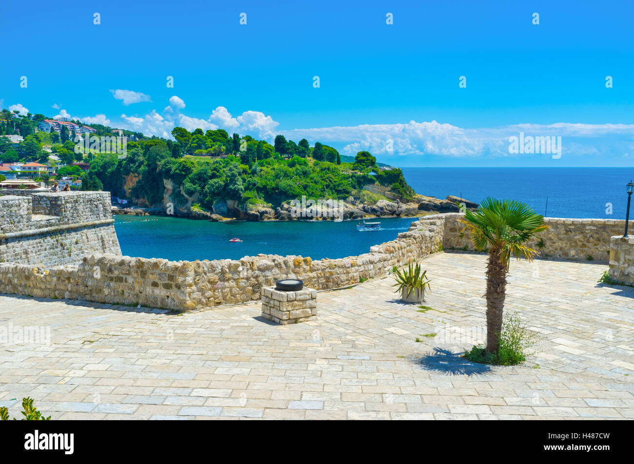 The Kalaja castle overlooks the coastline of Ulcinj and rocky cliffs ...