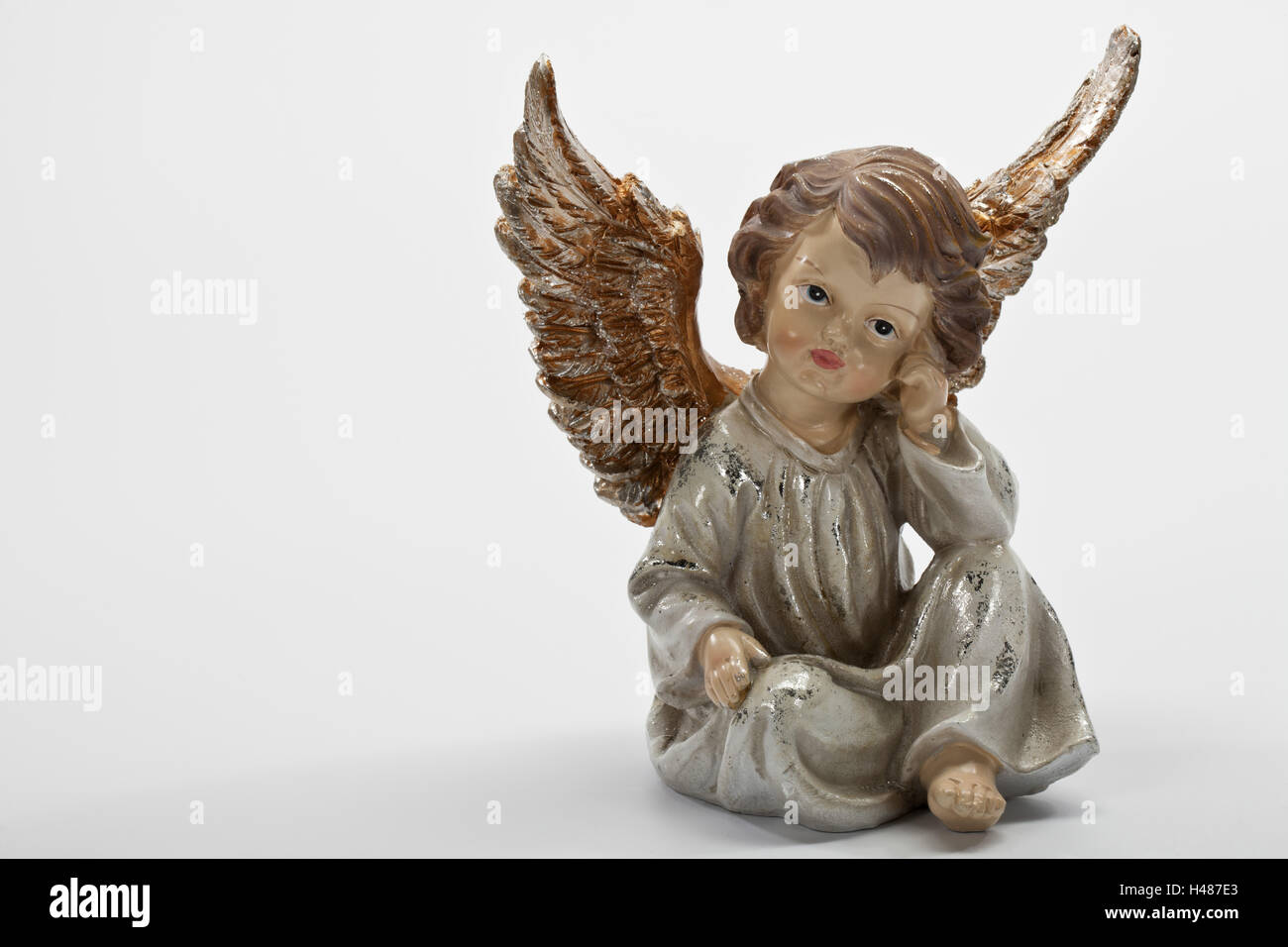 Angel's character, sit Stock Photo - Alamy