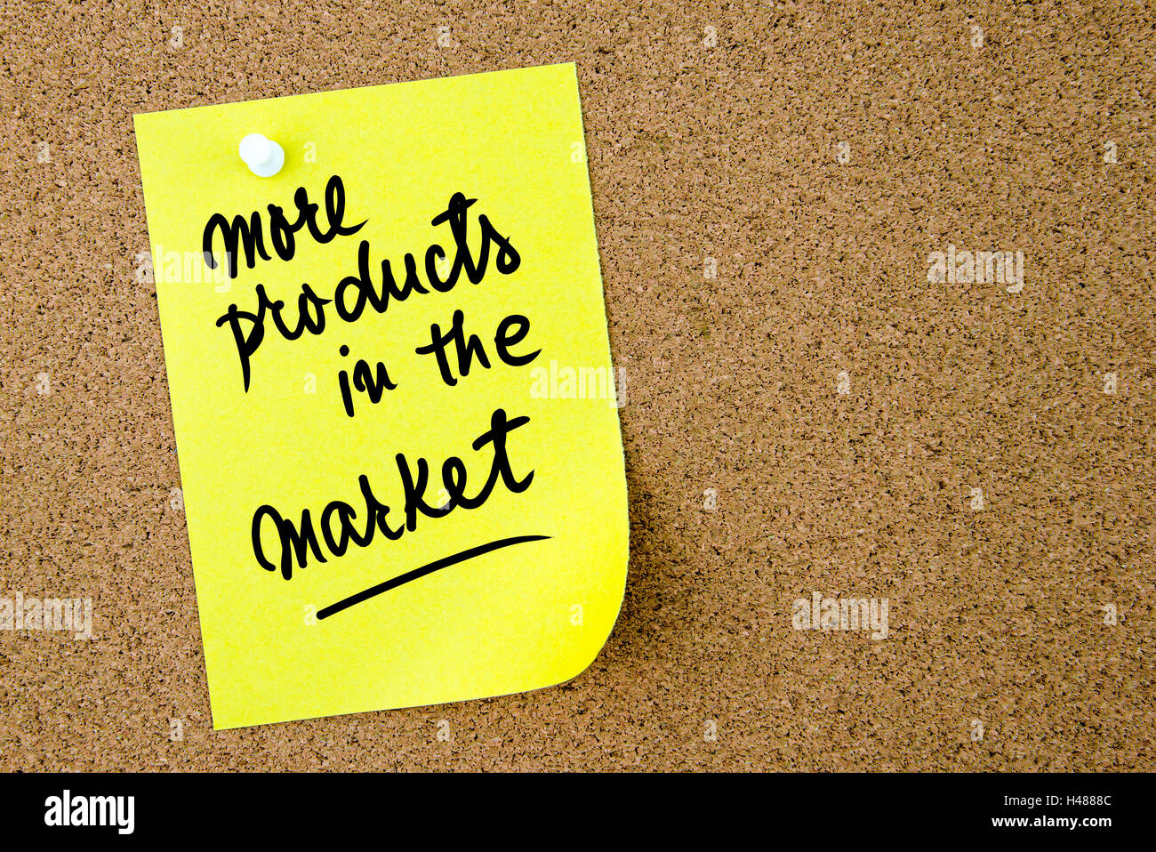More Products In The Market text written on yellow paper note pinned on ...