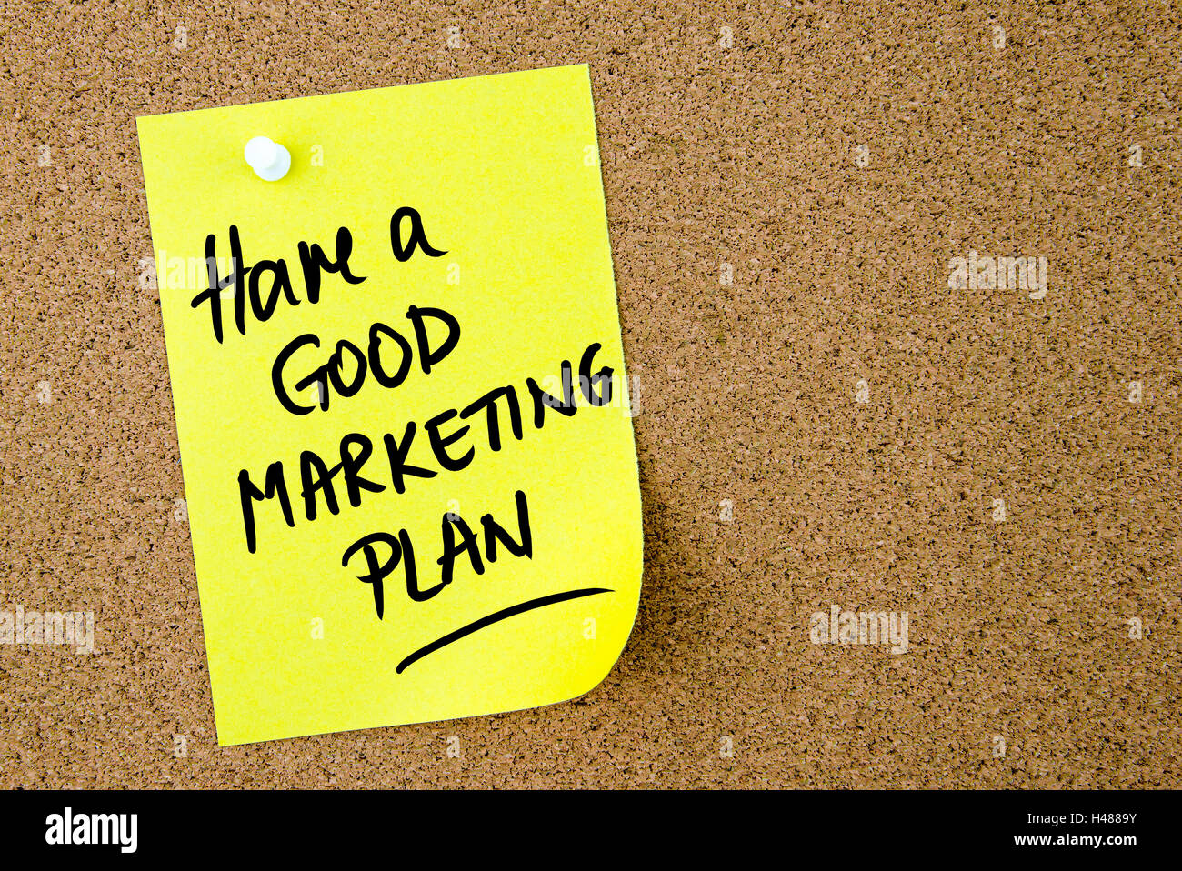 Have A Good Marketing Plan text written on yellow paper note pinned on ...