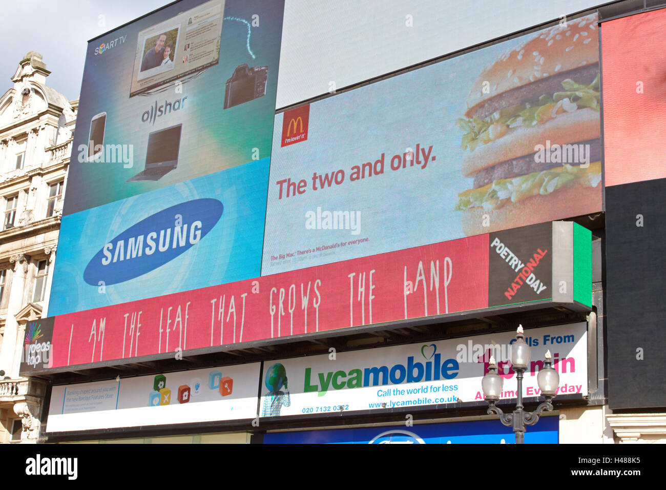 An LED advertising sign at Piccadilly Circus displays interpretations ...