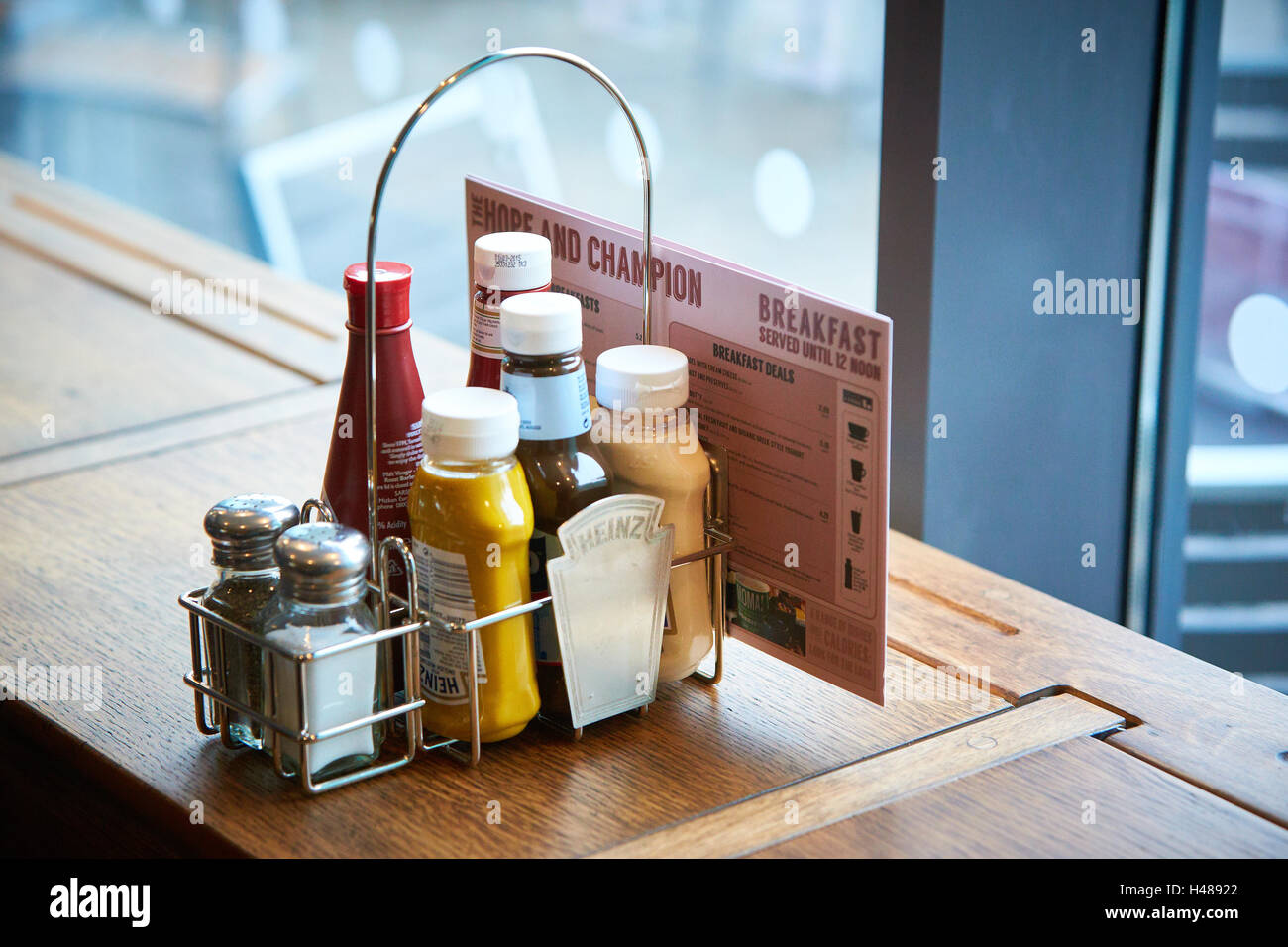 Condiments in a Wetherspoon pub Stock Photo - Alamy