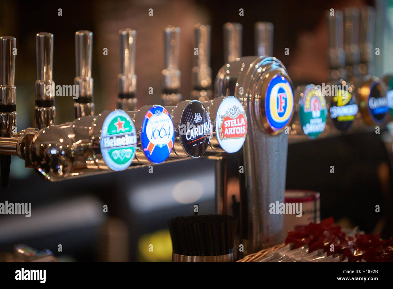 Beer taps in the Wetherspoon hope & Champion pub at Beaconsfield ...