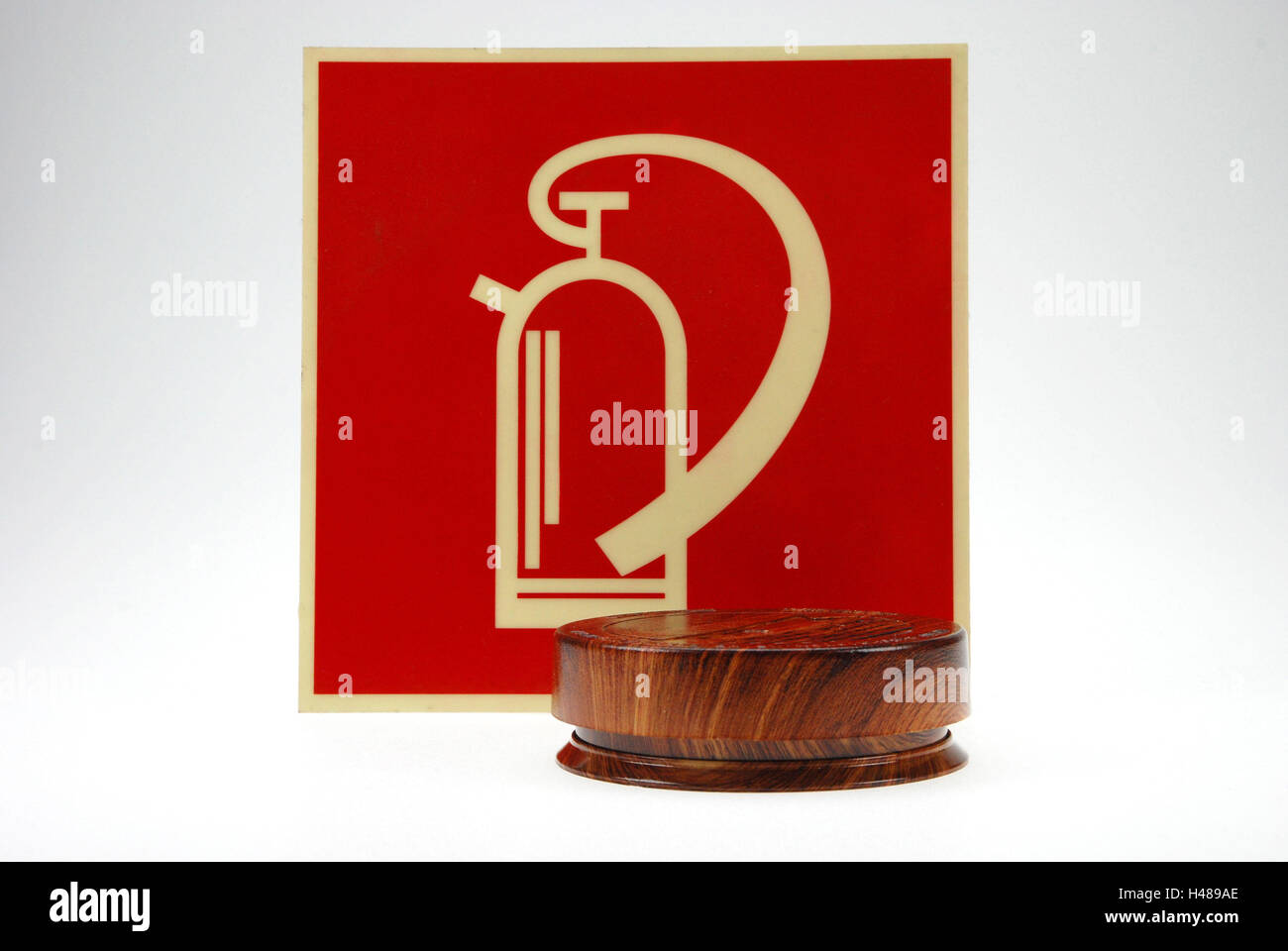 Smoke detector, fire extinguisher, tip notice board Stock Photo - Alamy