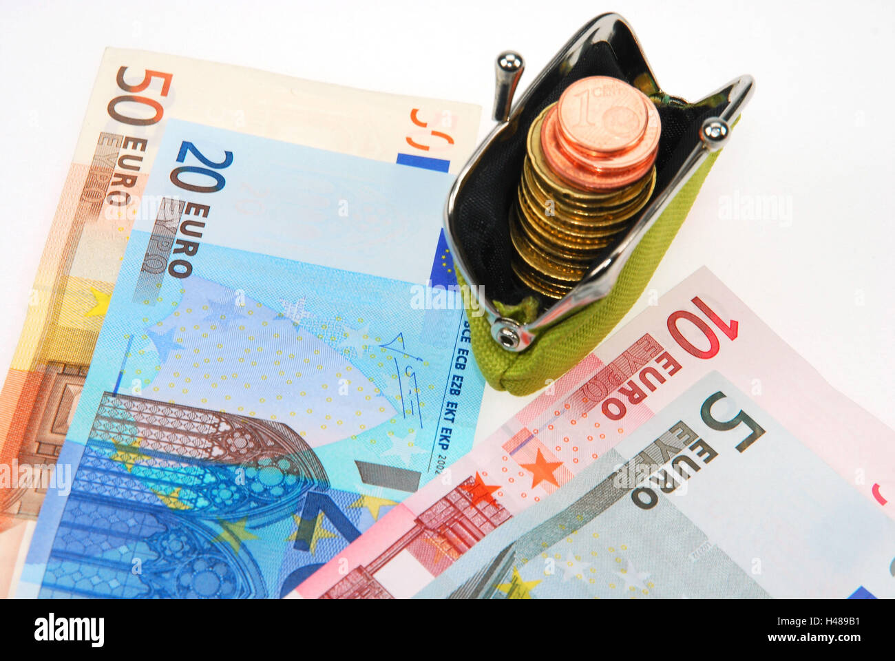 Change purse with coins and bank notes Stock Photo - Alamy
