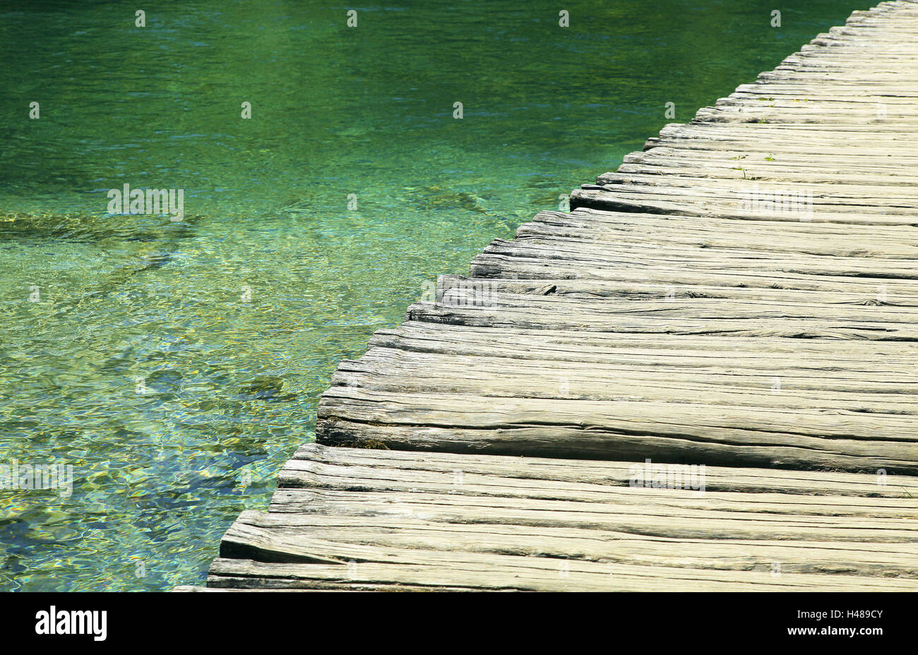 Plank way in the water Stock Photo - Alamy