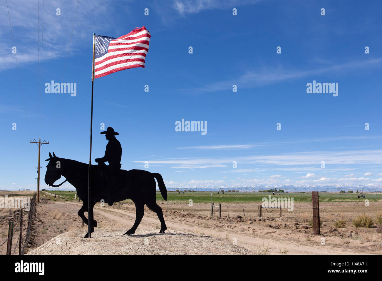 USA, Wyoming, ranch, sign, cowboy, US flag Stock Photo - Alamy