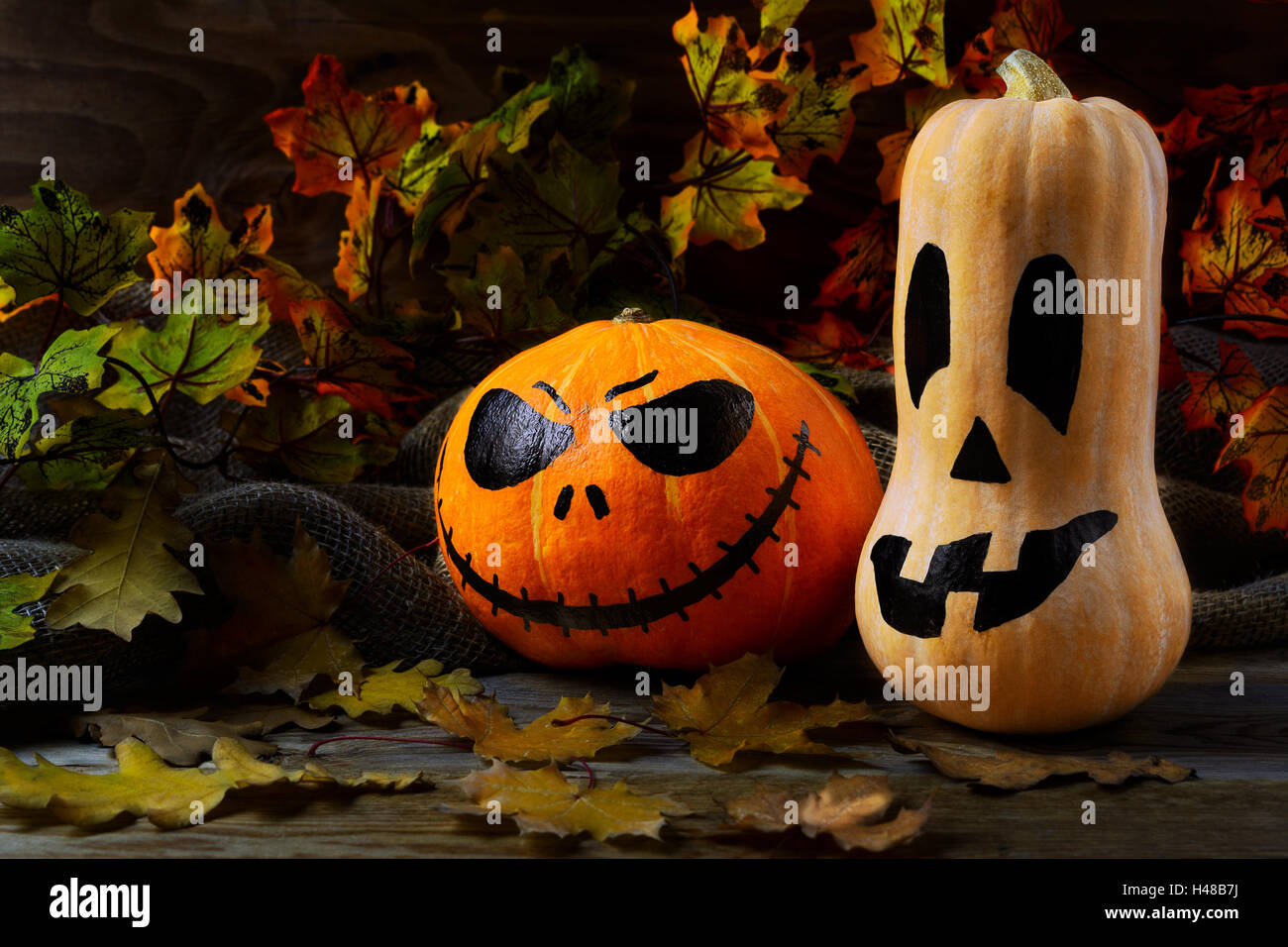 Halloween traditional jack-o-lantern and fall leaves. Halloween symbol ...