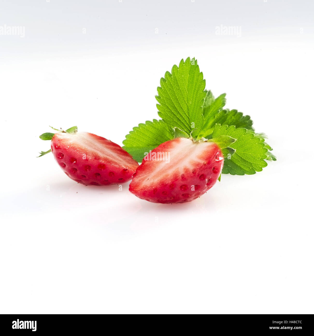 Strawberry cut two halves hi-res stock photography and images - Alamy
