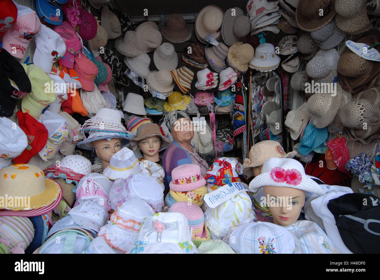 Hat shop, detail, shop assistant, no model release, Russia, person ...