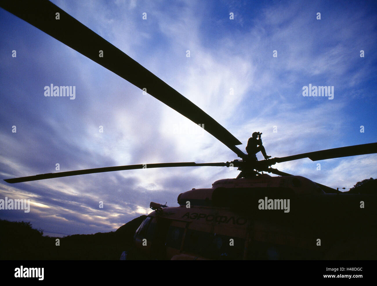 Helicopters, rotor leaves, person, sit, silhouette, Russia, Kamchatka ...