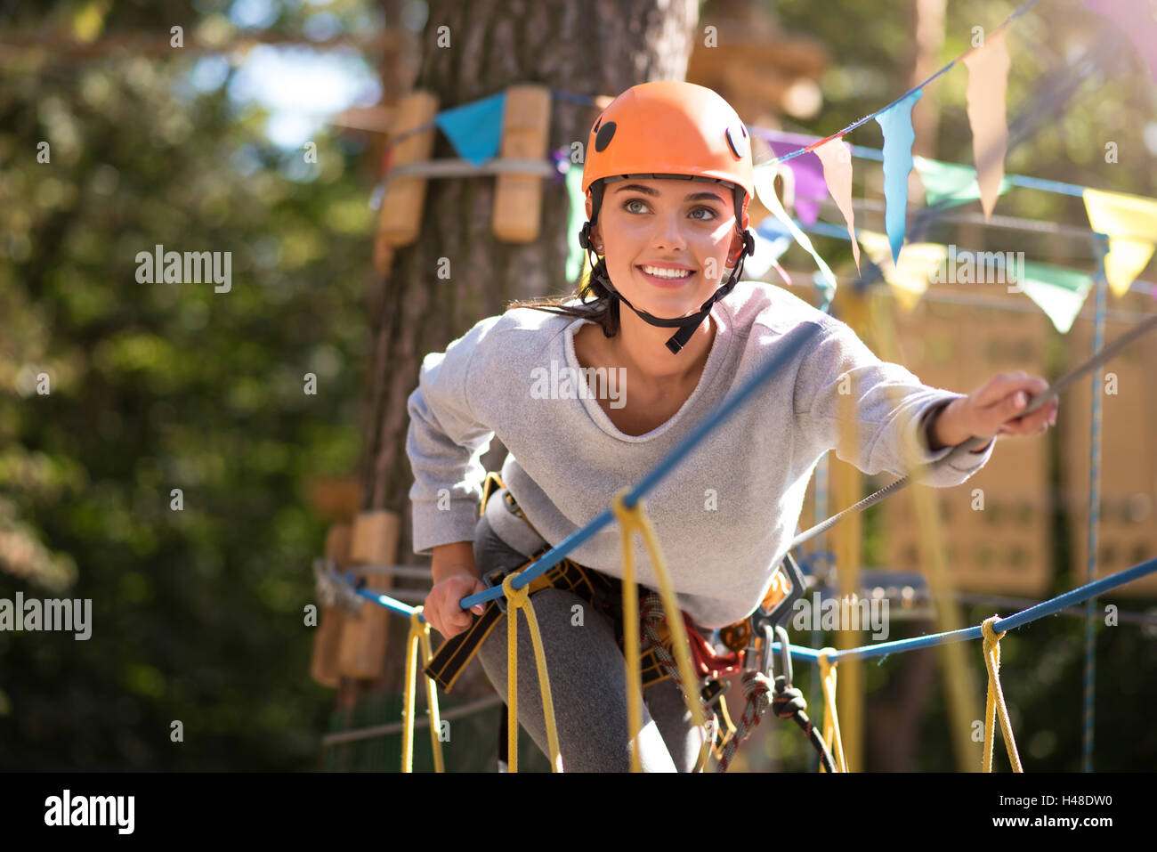 Pleasant confident woman moving forwards Stock Photo - Alamy