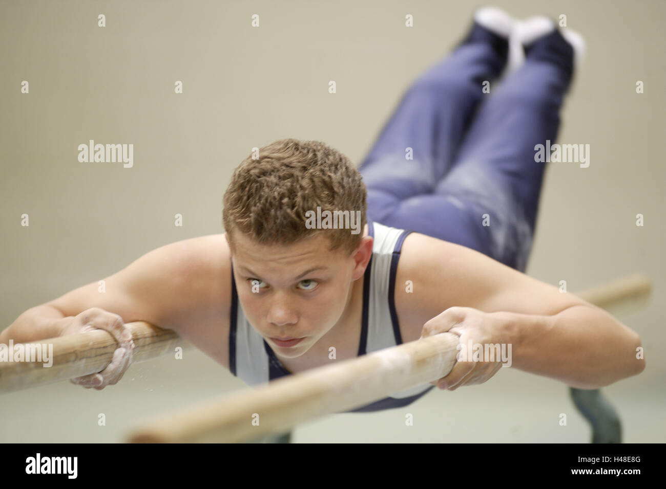 Young person, ingot, do gymnastics Stock Photo - Alamy