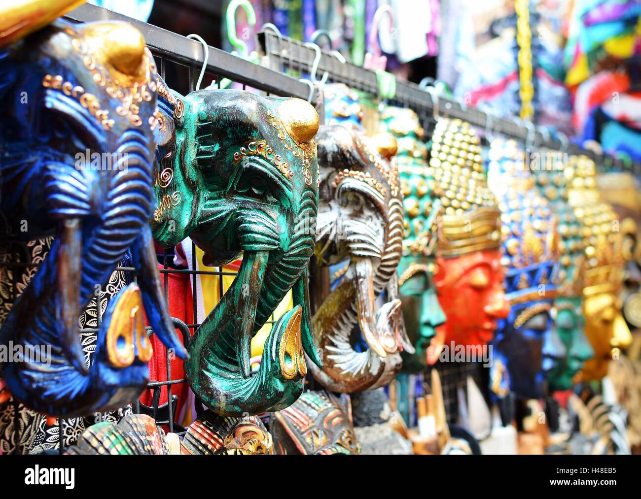 Famous mask souvenirs at Ubud Market Stock Photo - Alamy