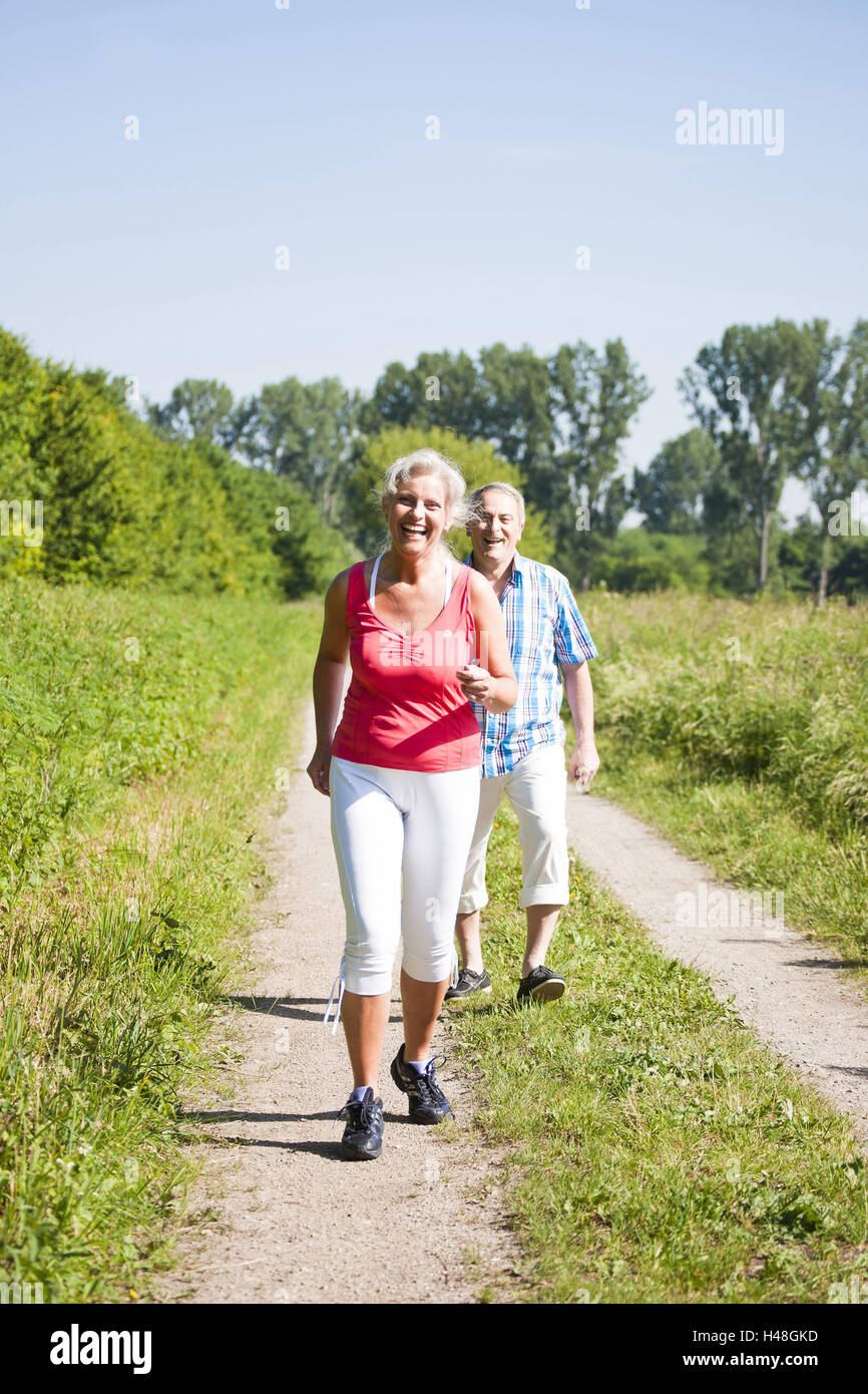 Senior citizen's couple, nature, motion, run, go Stock Photo - Alamy