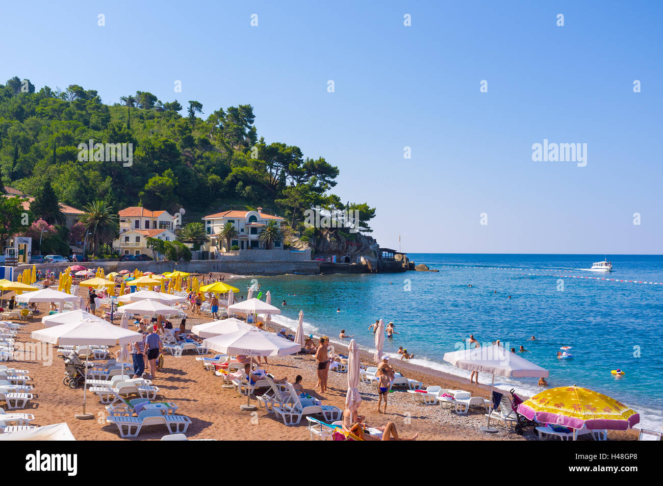 The long sandy beach of the popular tourist resort, Petrovac Montenegro ...